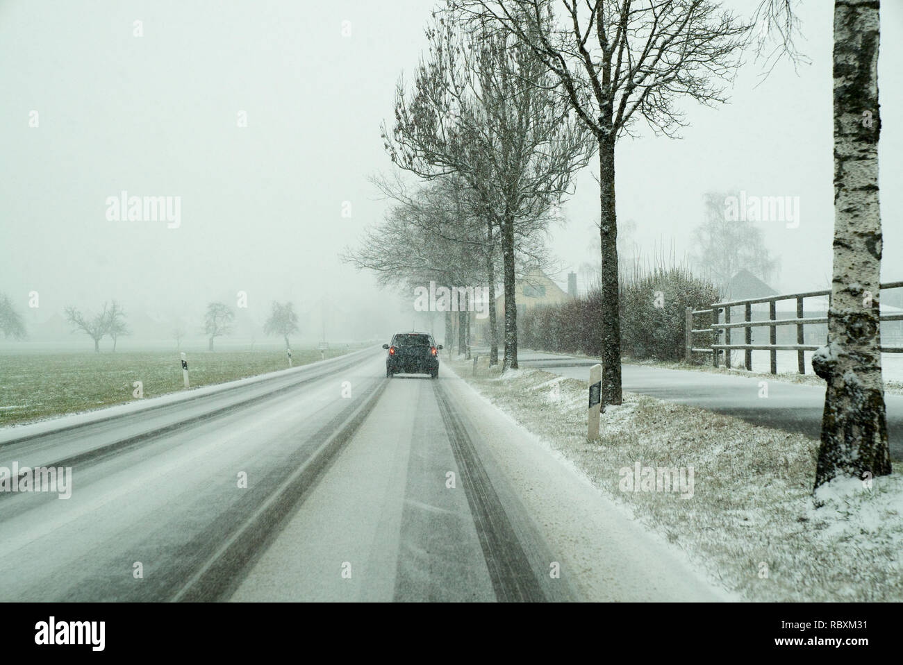 adverse dangerous road conditions on a highway in winter during heavy ...