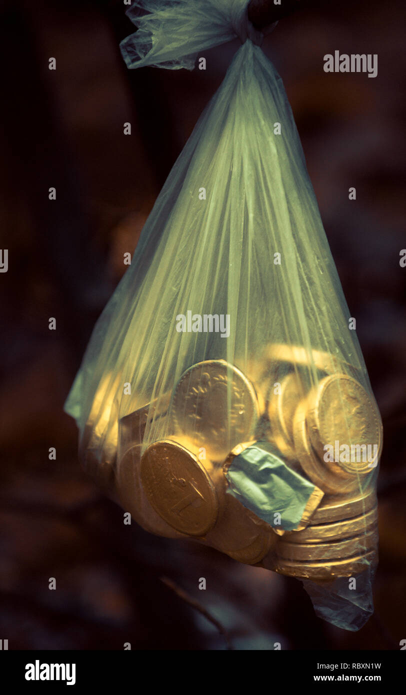 Bag of gold coins Stock Photo - Alamy