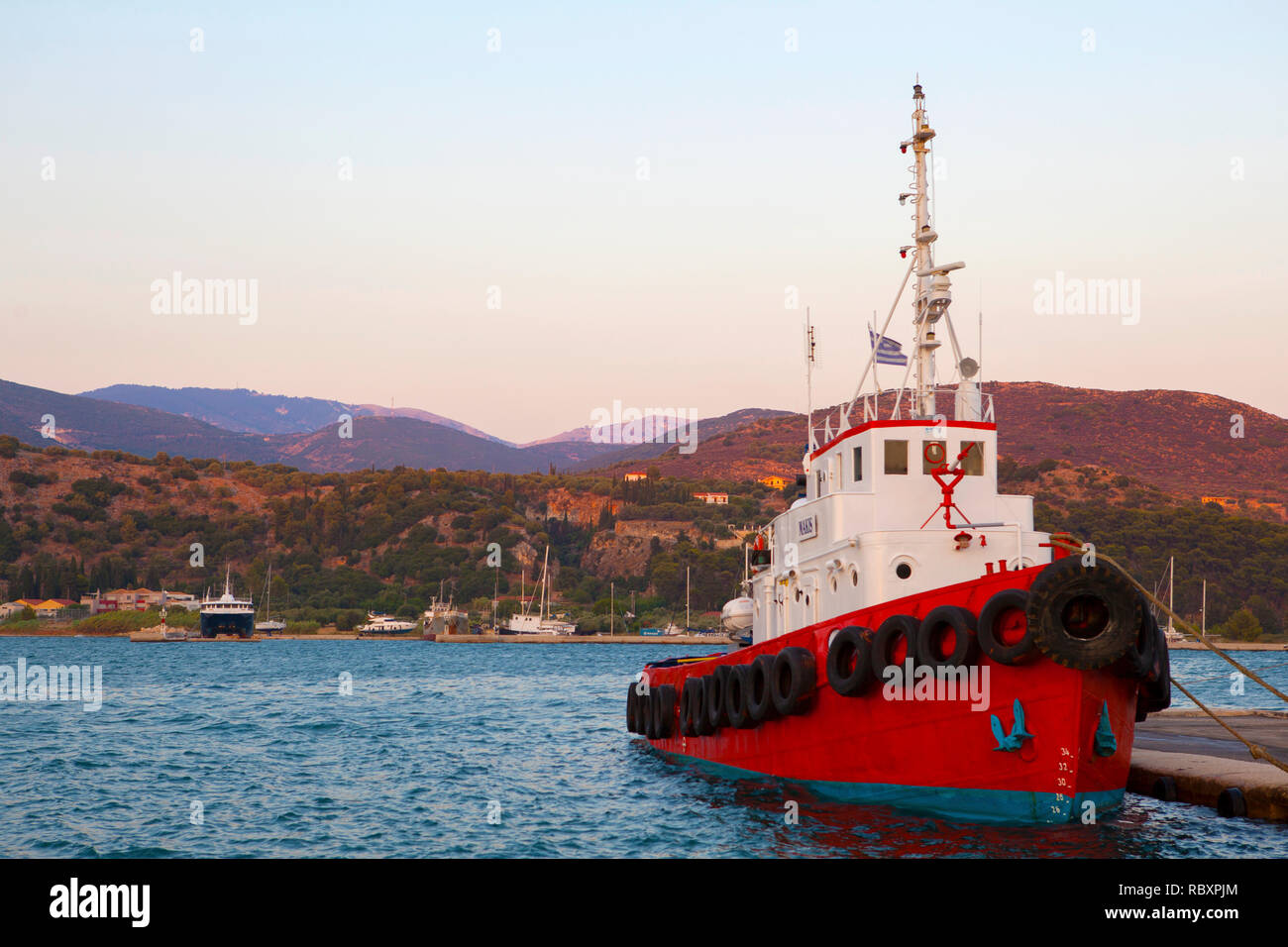 Tug boat moored to a jetty in Argostoli, Kefalonia, Greece Stock Photo ...