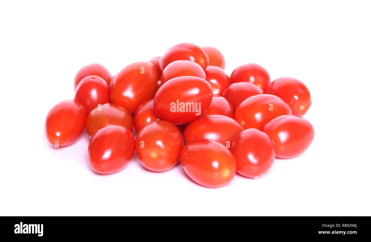 Pile cherry tomatoes close Cut Out Stock Images & Pictures - Alamy
