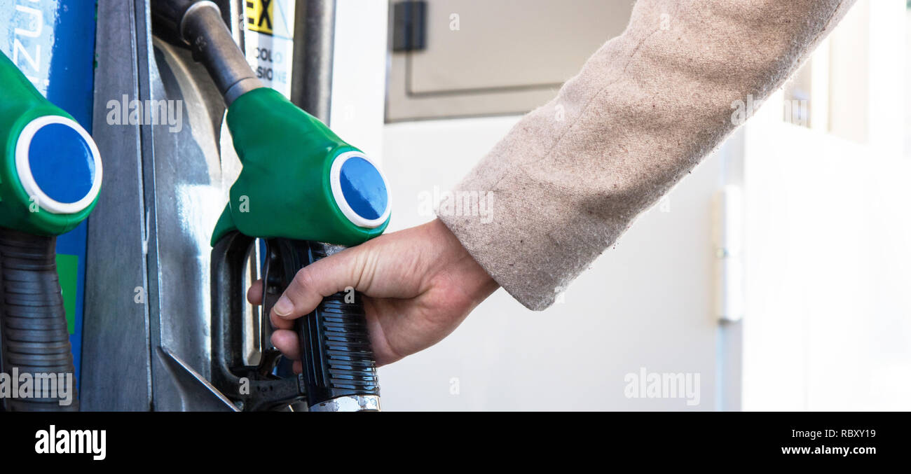 Happy girl at the gasoline station Stock Photo - Alamy