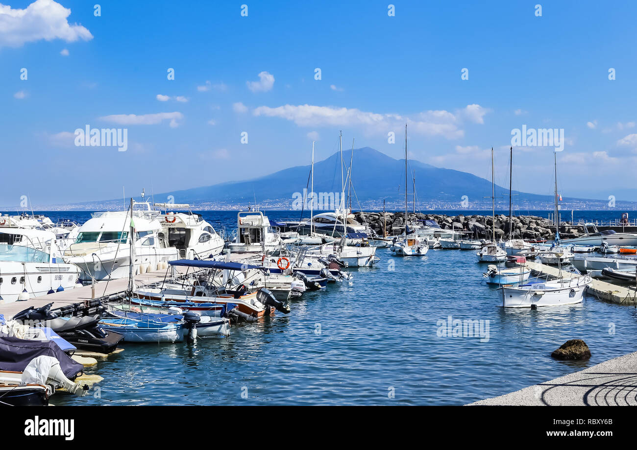 Harbor at Vico Equense, the volcano Mount Vesuvius in the background ...