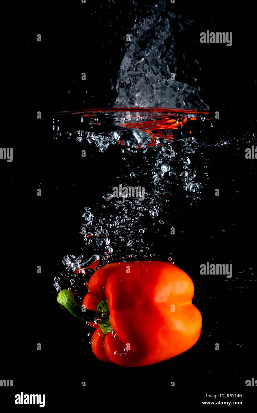 fresh organic red bell pepper or sweet pepper vegetable cleaning and ...