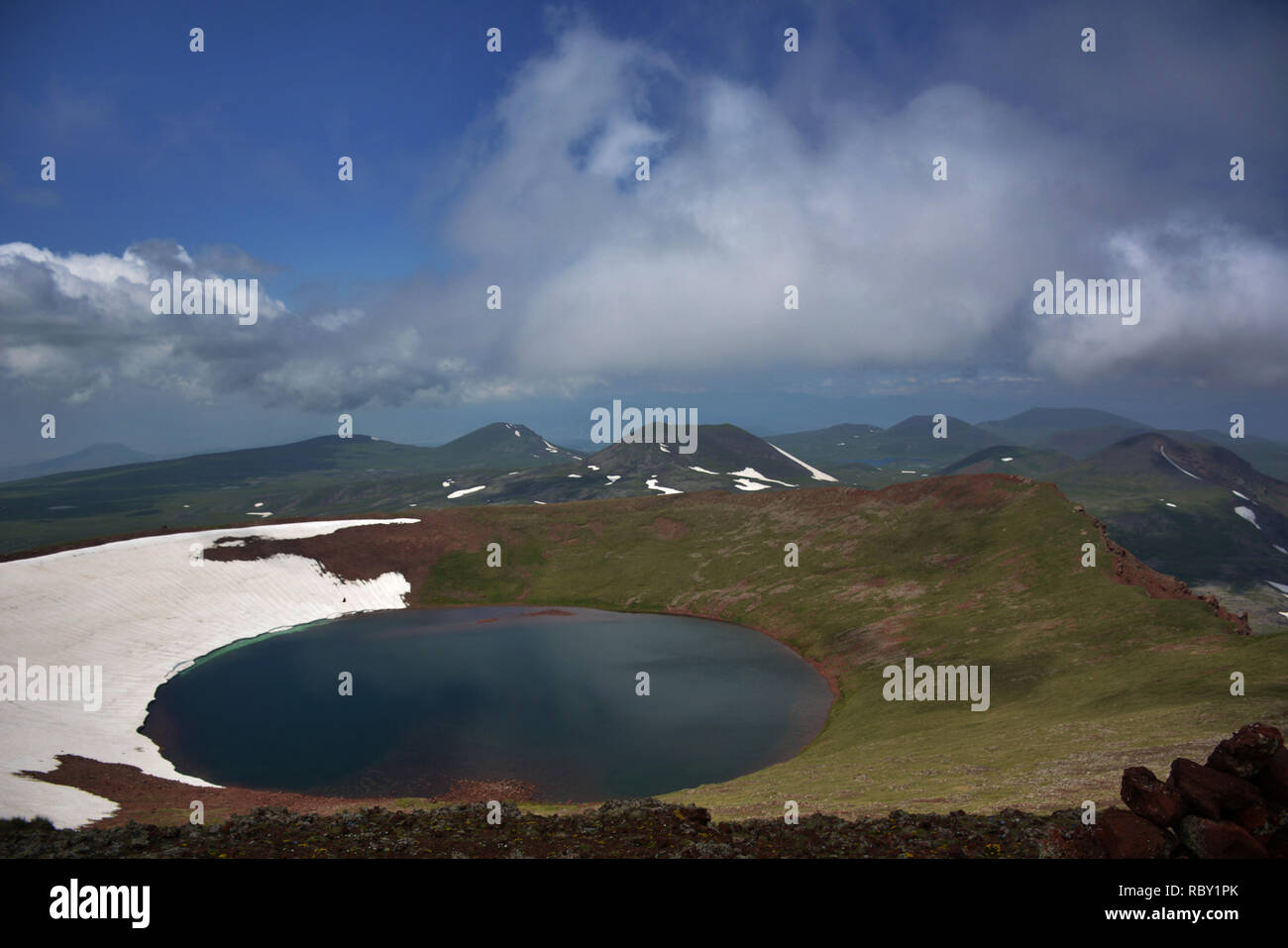 Beautiful crater lake at the mountains. Mount Azhdahak is a volcano in ...
