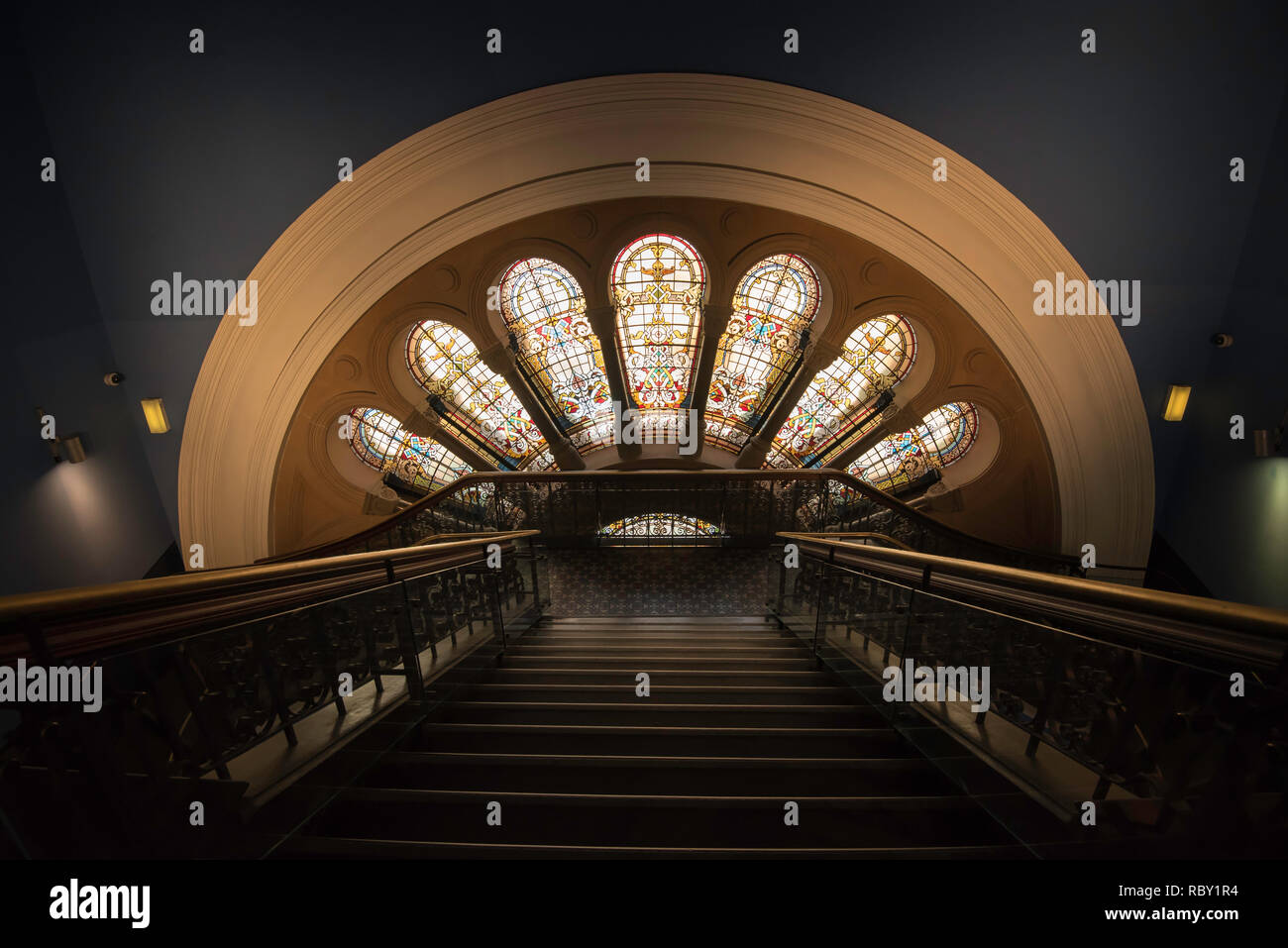 An interior view of stained glass windows on the Western side of the ...