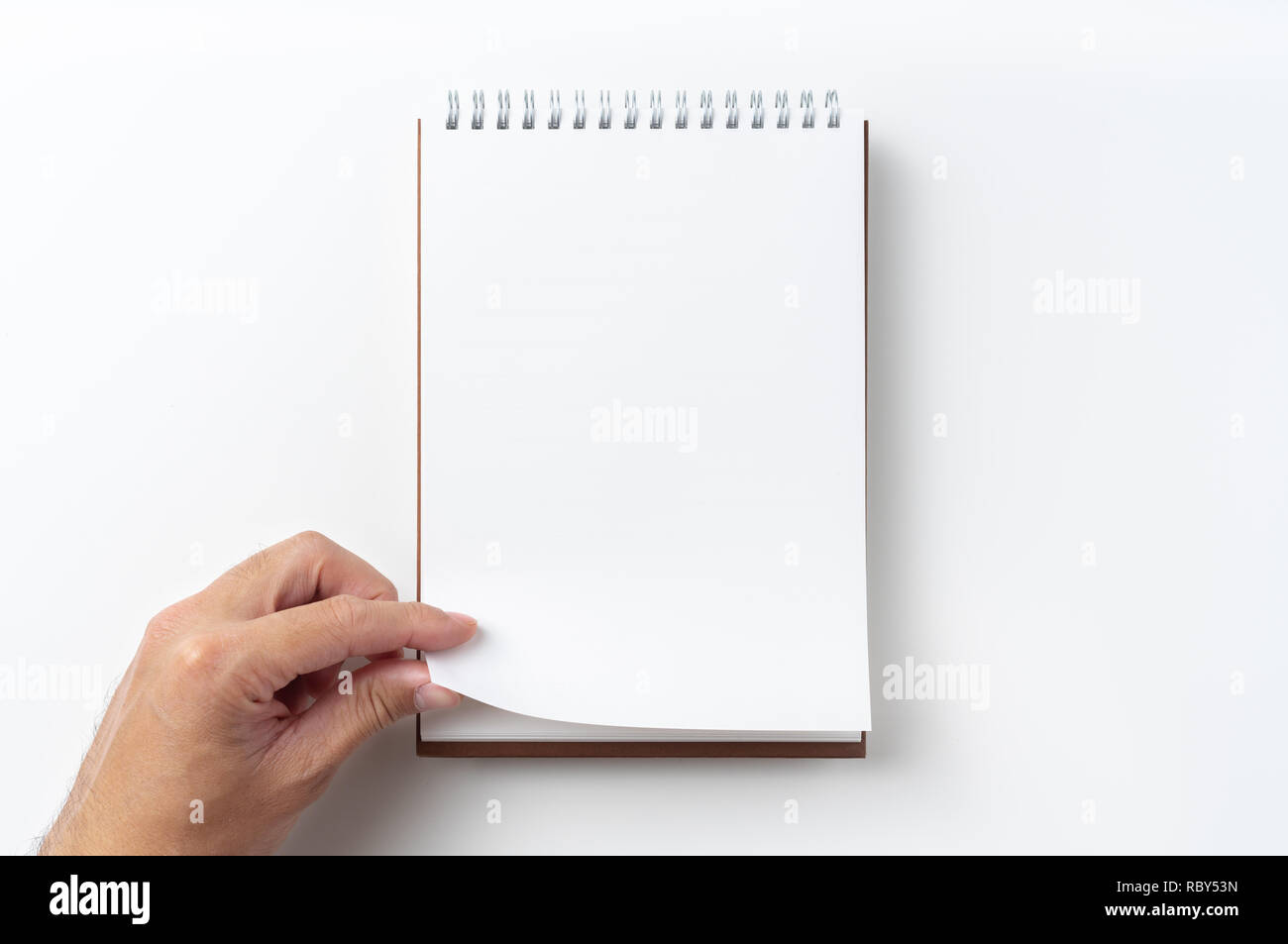 Design concept - Perspective view brown hardcover spiral notebook, man ...