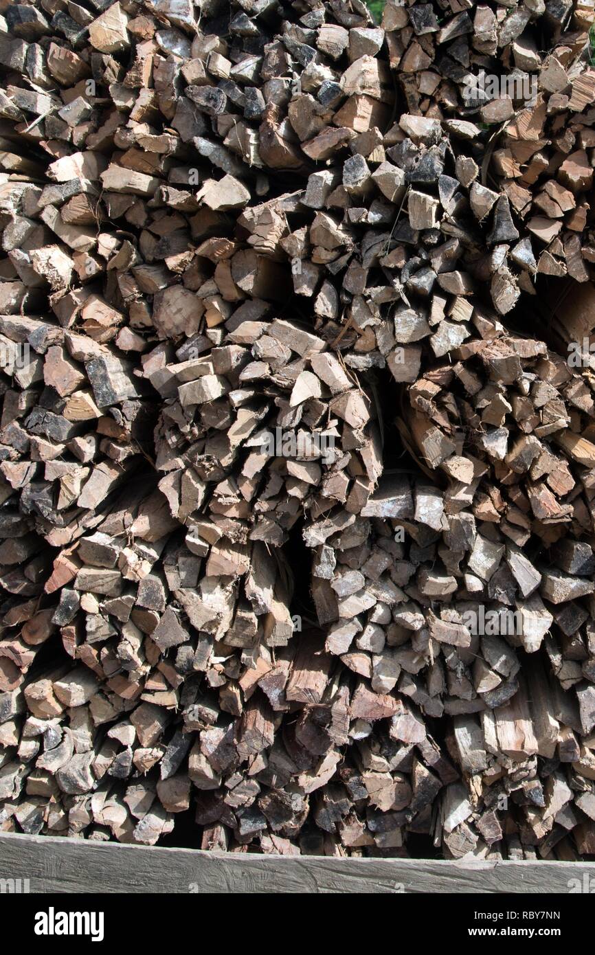 Wood firewood is used for cooking food at the fireplace Stock Photo - Alamy