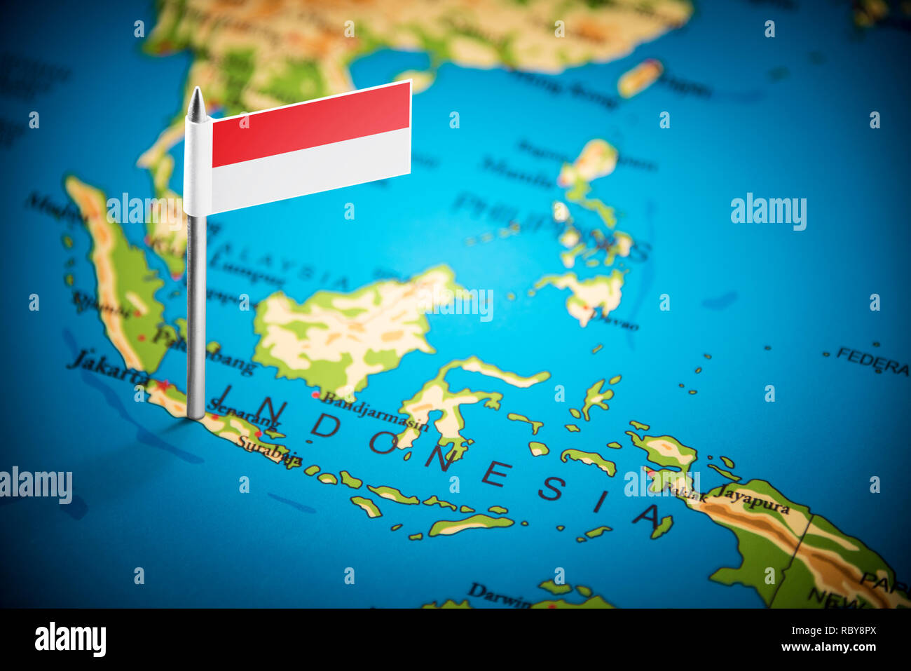 Indonesia marked with a flag on the map Stock Photo - Alamy