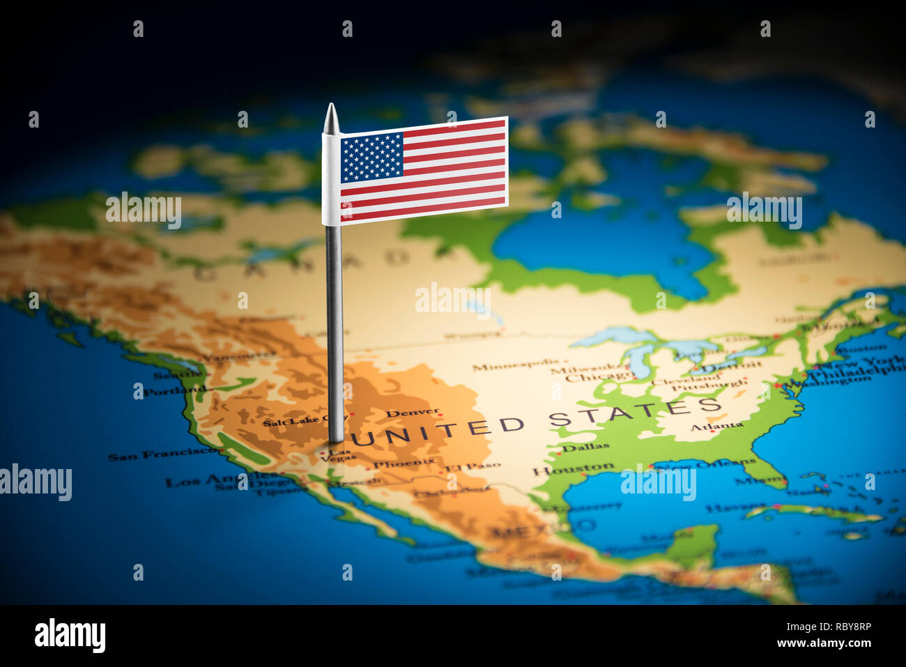 USA marked with a flag on the map Stock Photo - Alamy