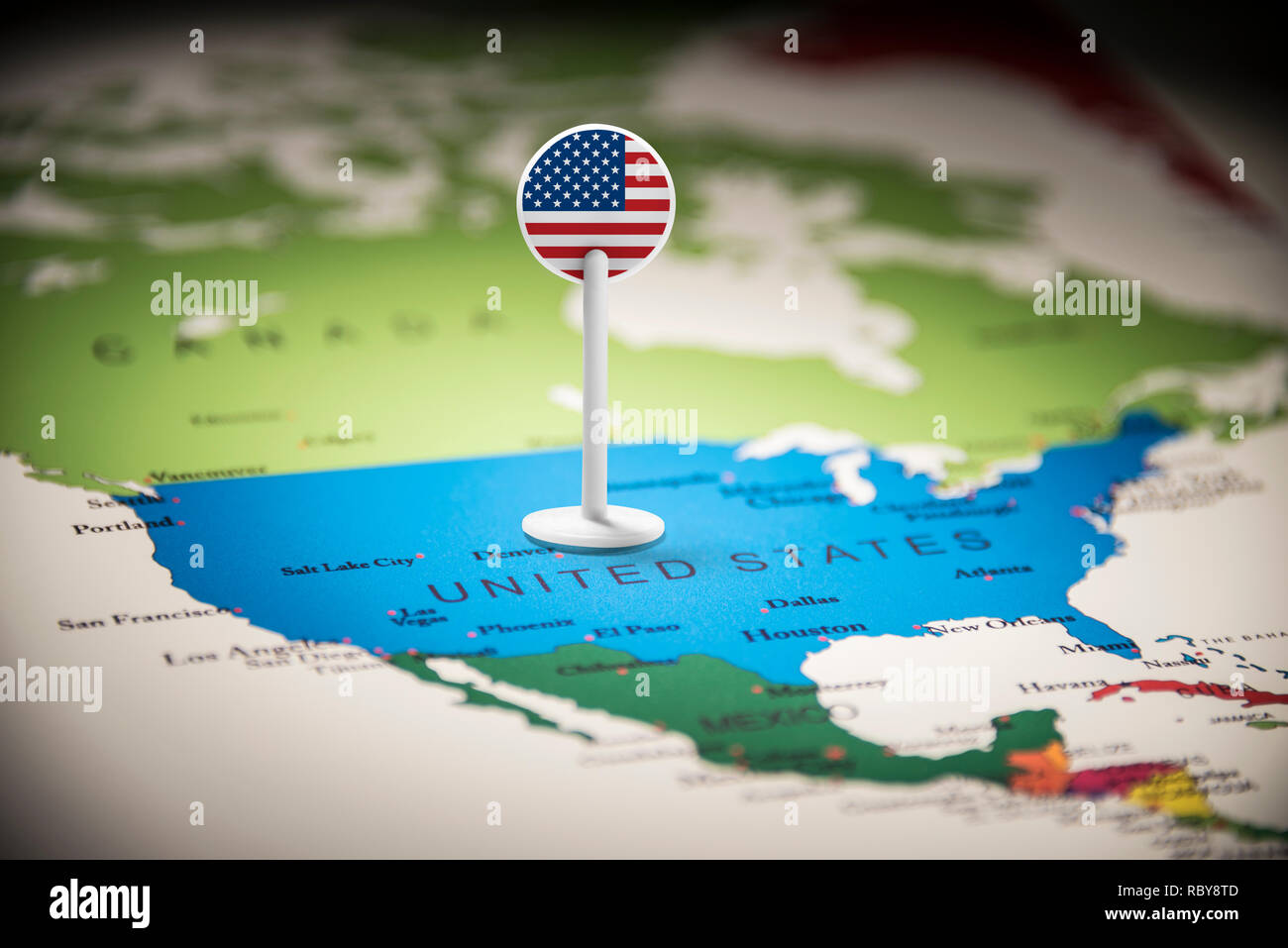 USA marked with a flag on the map Stock Photo - Alamy