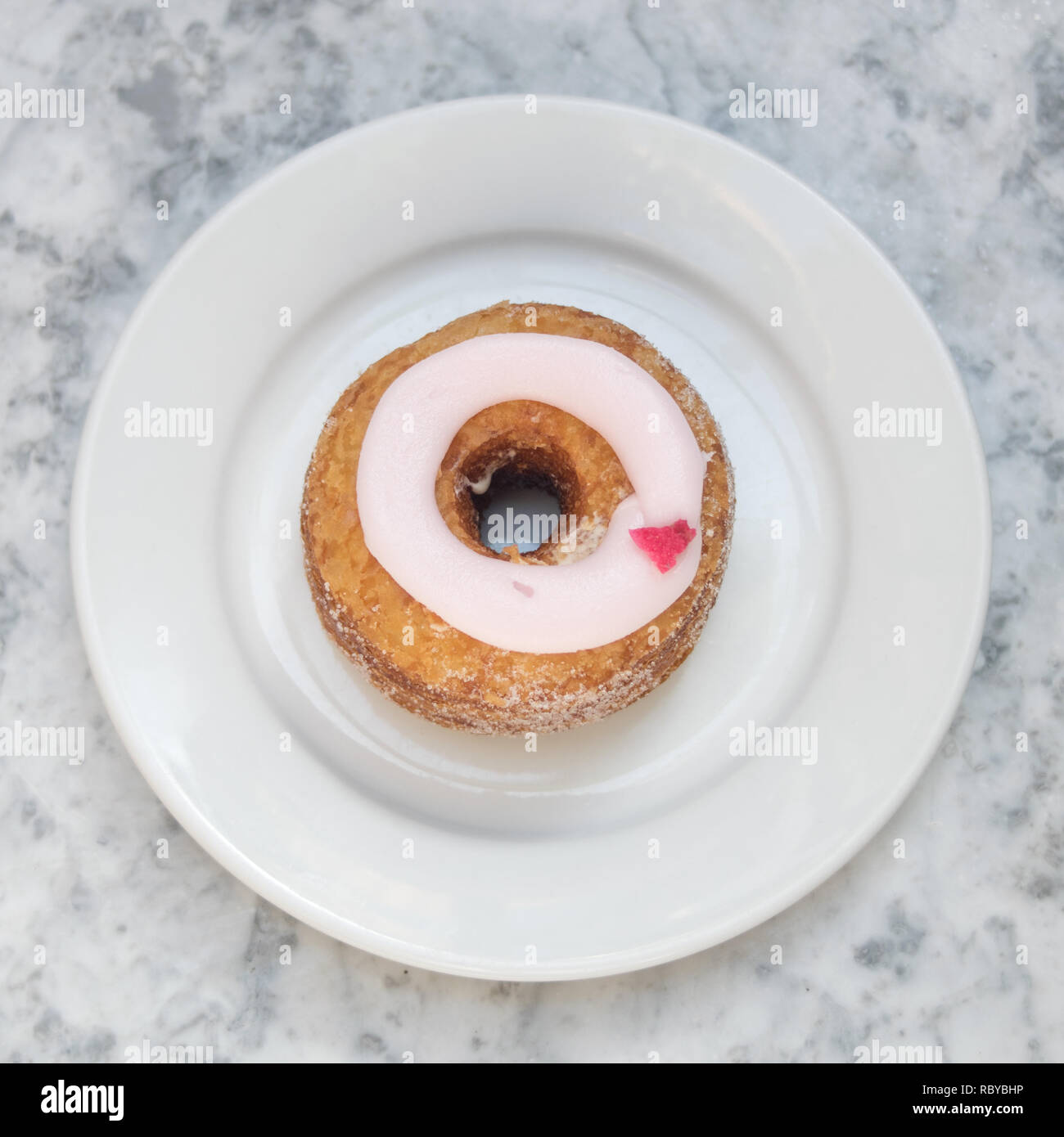 donut on a plate Stock Photo - Alamy