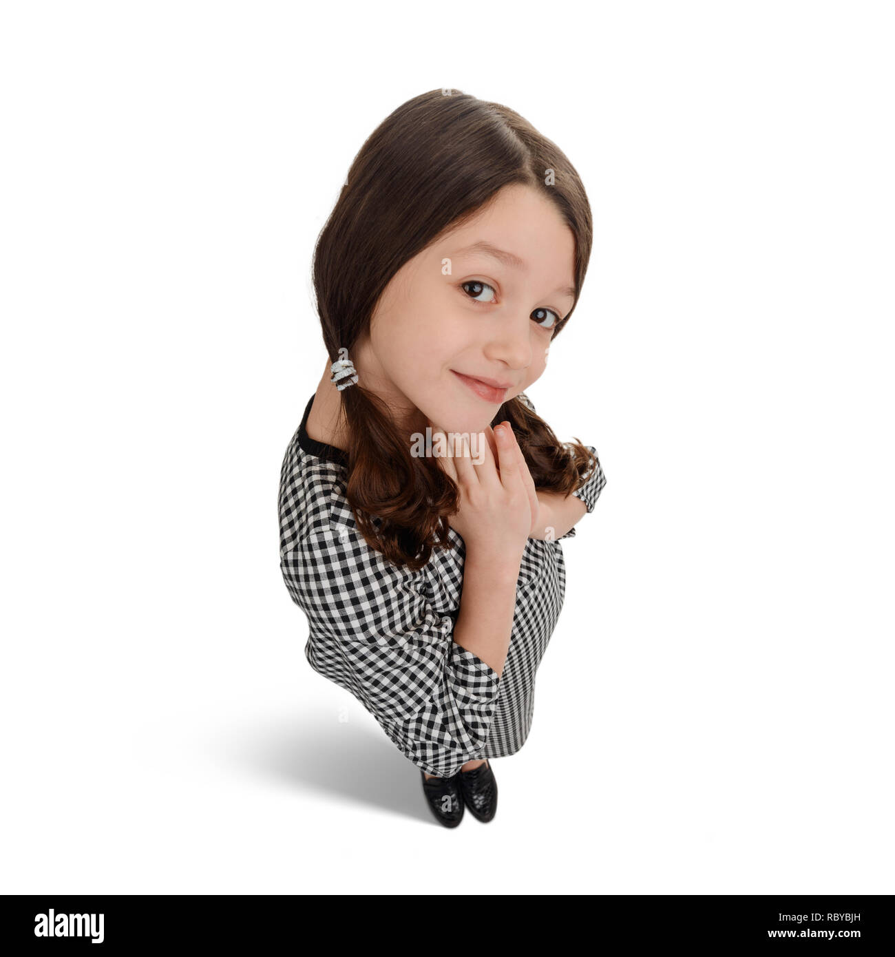 Shy little girl on white Stock Photo - Alamy