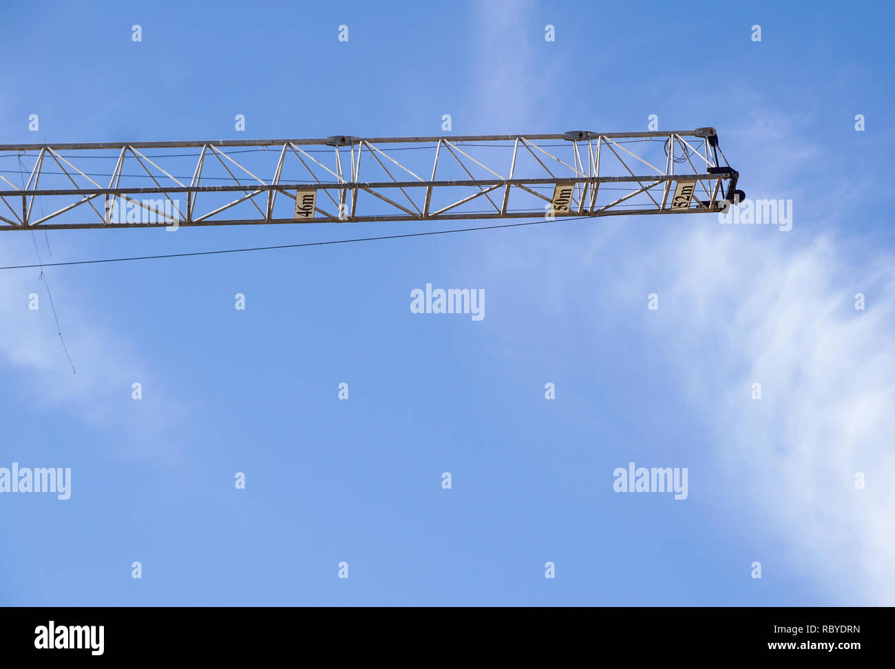 Yellow and blue tower crane hi-res stock photography and images - Alamy