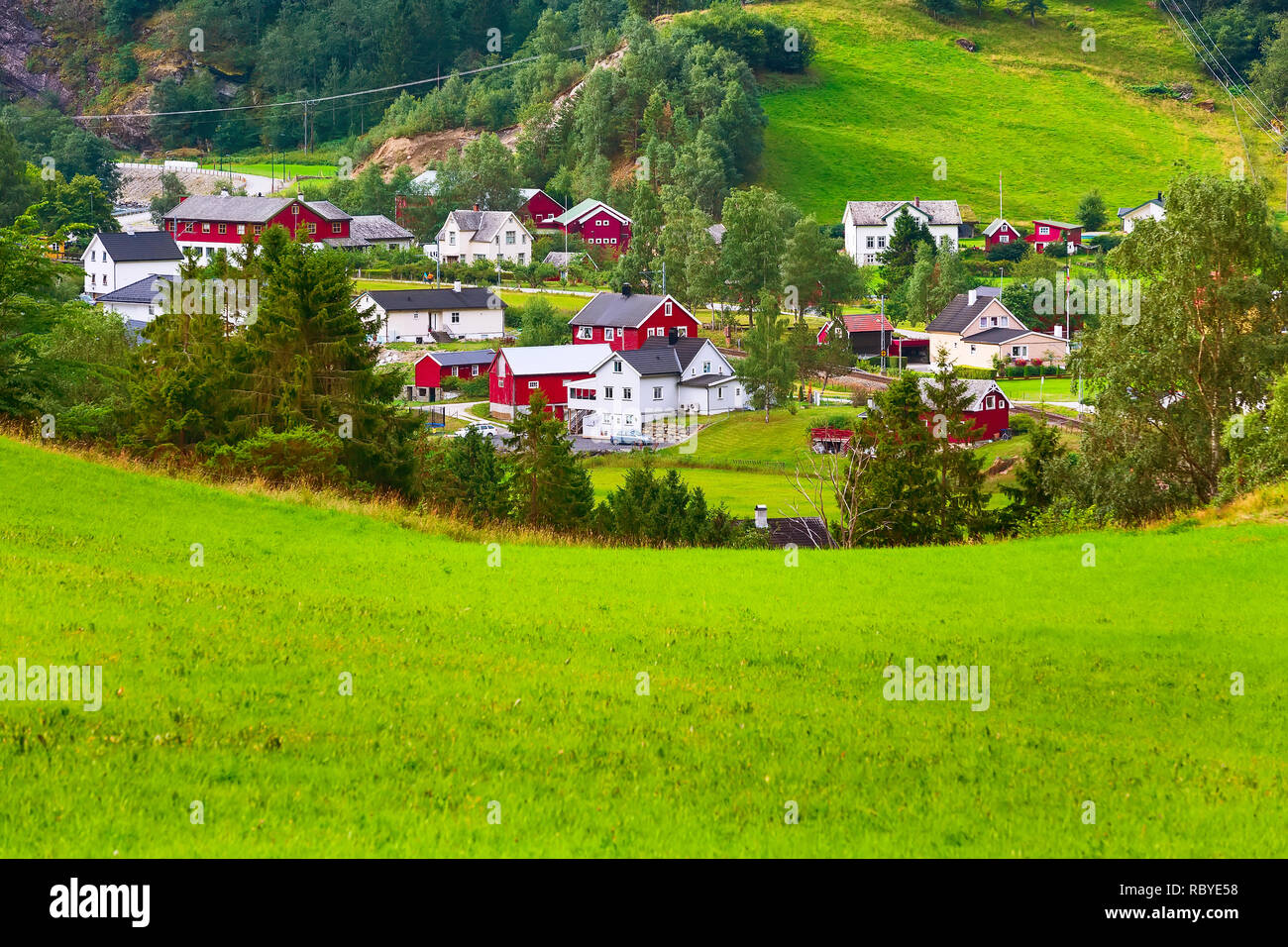 Norwegian fjord village panoramic landscape, Norway. Green mountains ...