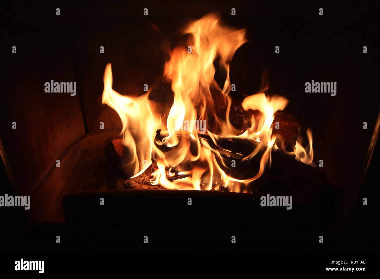 Beautiful hot fire burning in a fireplace Stock Photo - Alamy