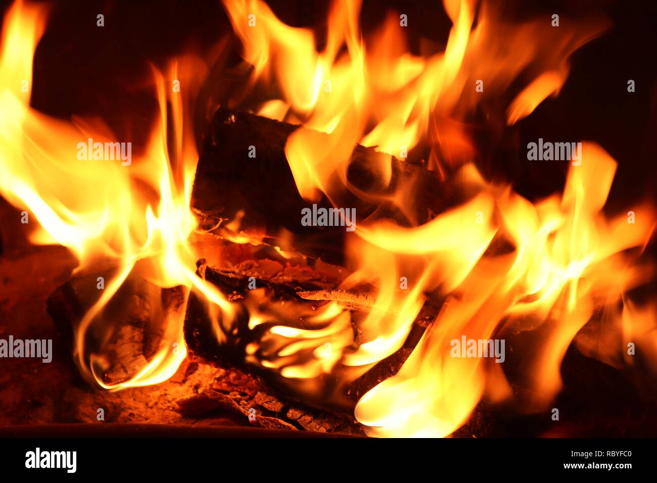 Beautiful hot fire burning in a fireplace Stock Photo - Alamy