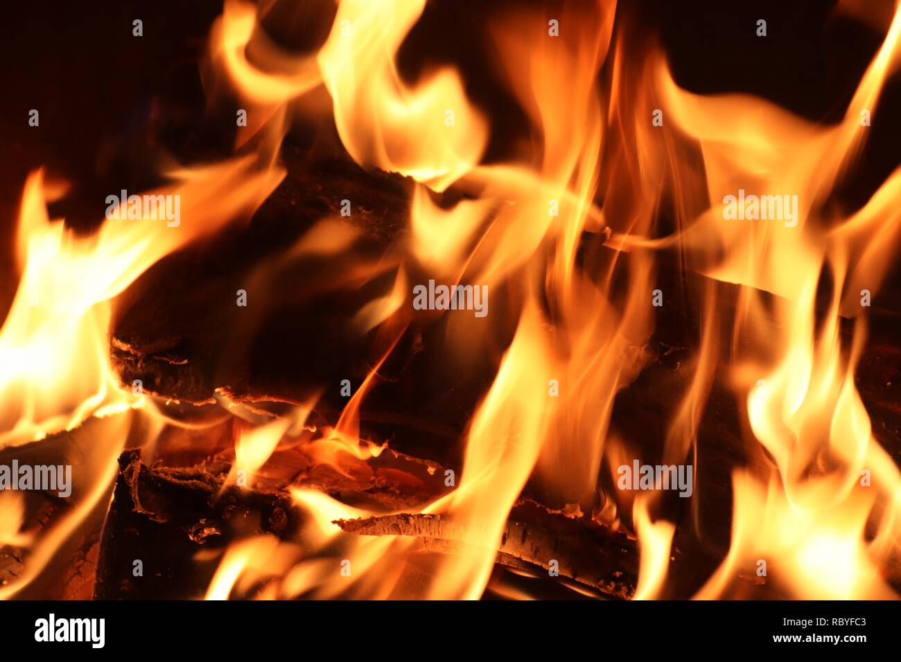 Beautiful hot fire burning in a fireplace Stock Photo - Alamy
