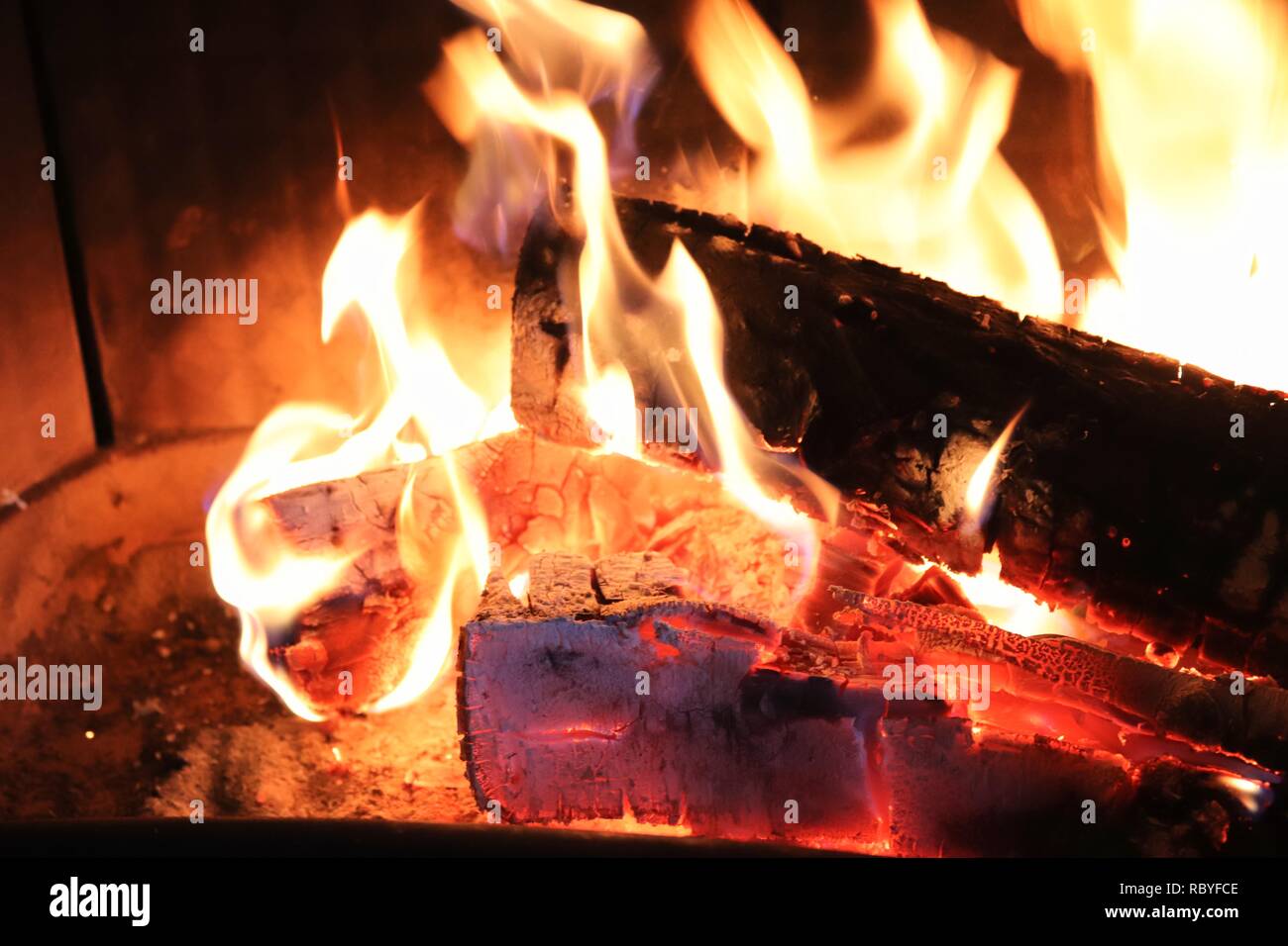 Beautiful hot fire burning in a fireplace Stock Photo - Alamy