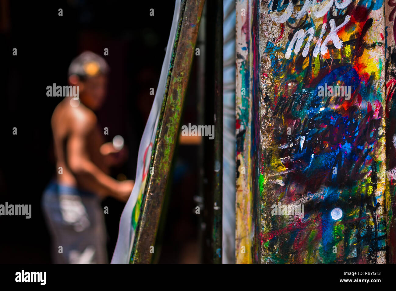 An abstract texture is seen on the scribbled wall in the sign painting ...