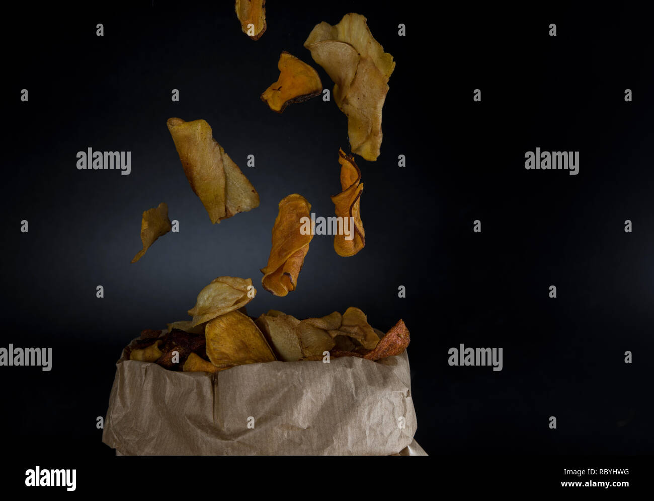 Potato chips falling hi-res stock photography and images - Alamy