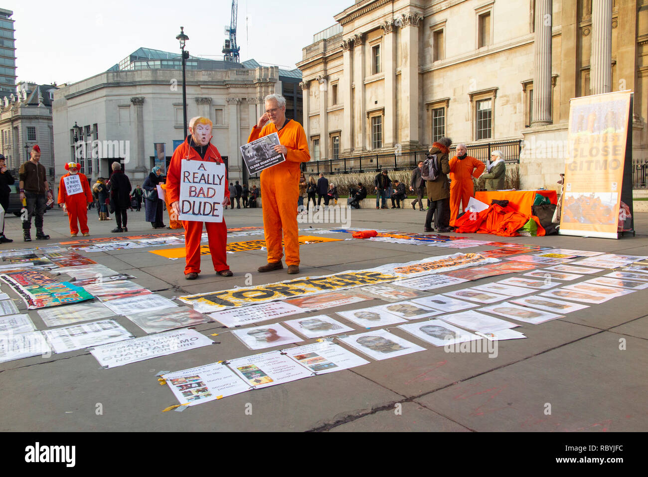 Demonstrators dressed Donald Trump protest about the ill treatment of ...