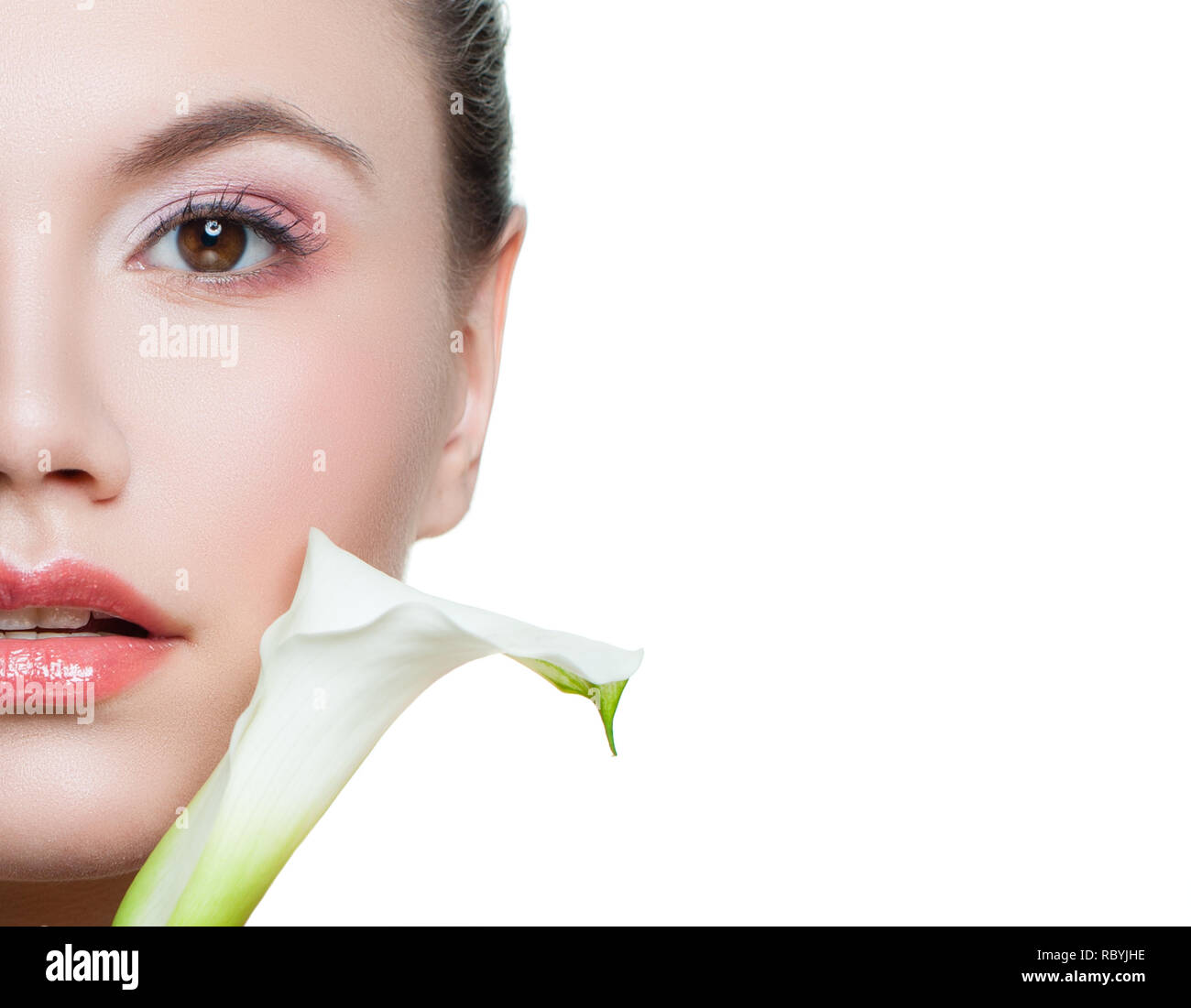White lily flowers and young woman face closeup isolated on white ...