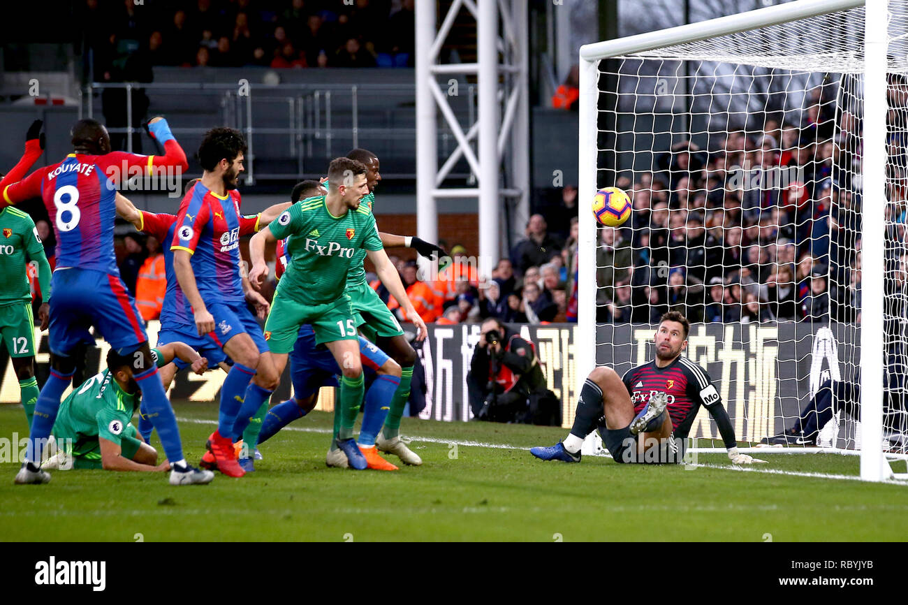 Watford goalkeeper Ben Foster (right) fails to make a save as team mate ...