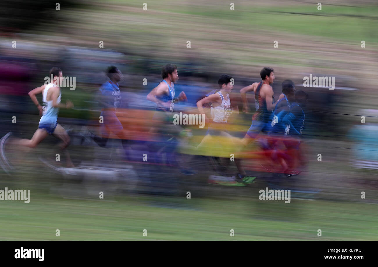 Runners take part in the mens 8km cross country event during the ...