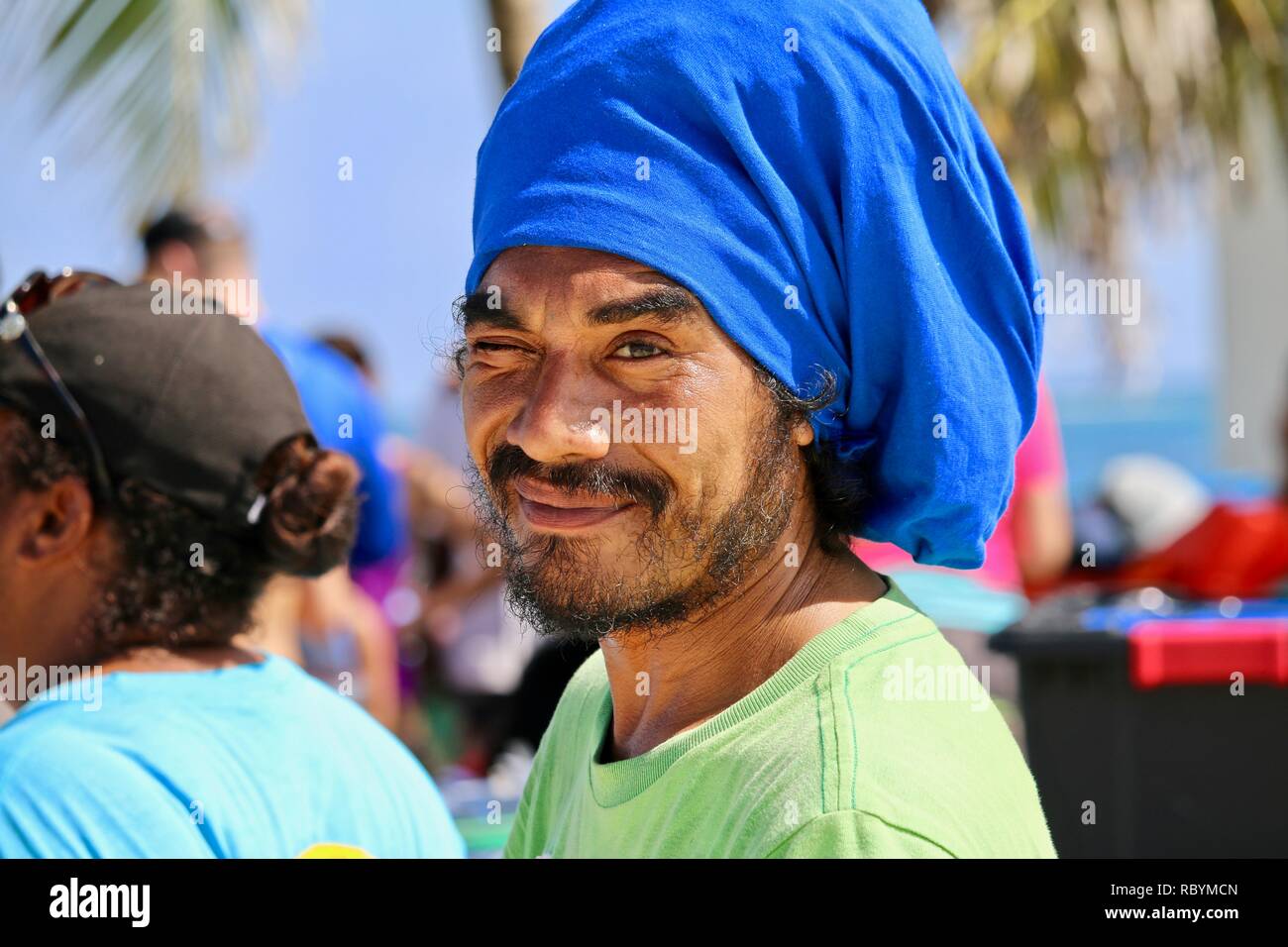 A Belize local man with dreadlocks wrapped up in the sunshine Stock ...