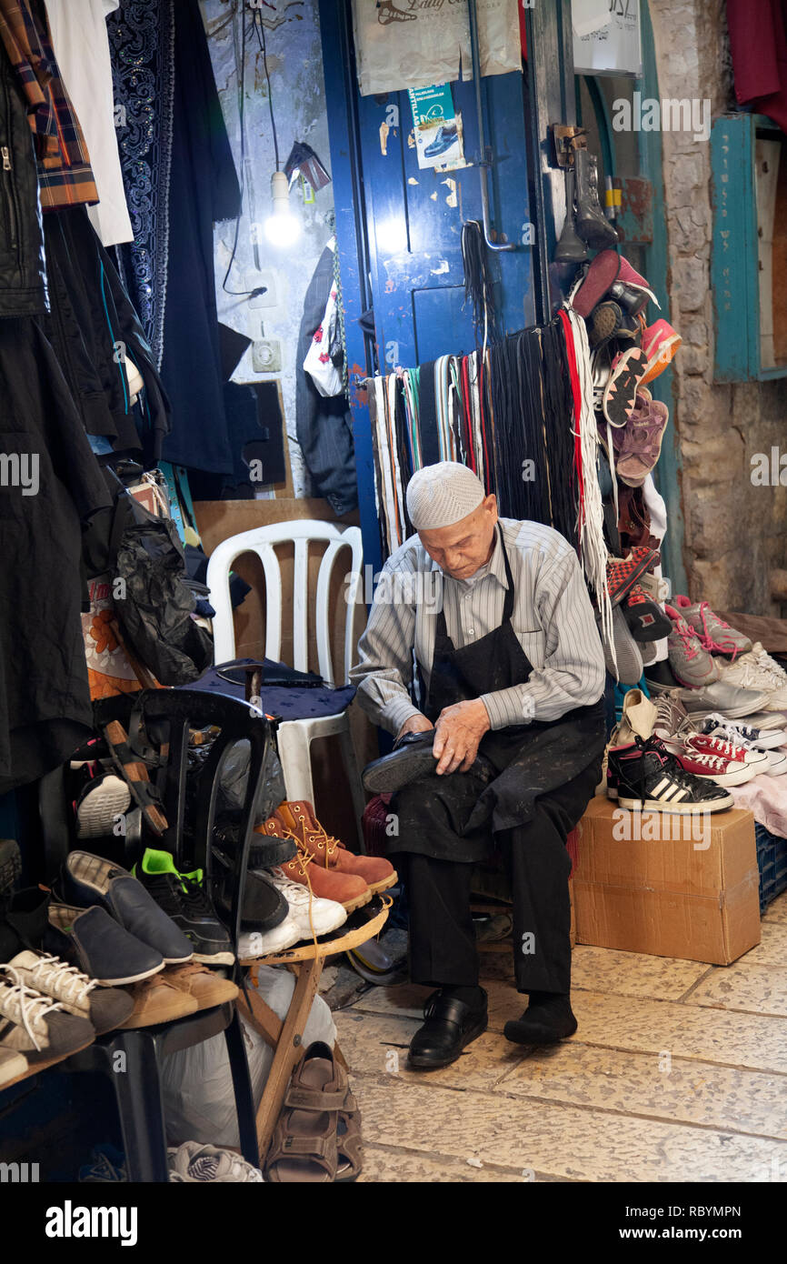 Shoe mender hi-res stock photography and images - Alamy
