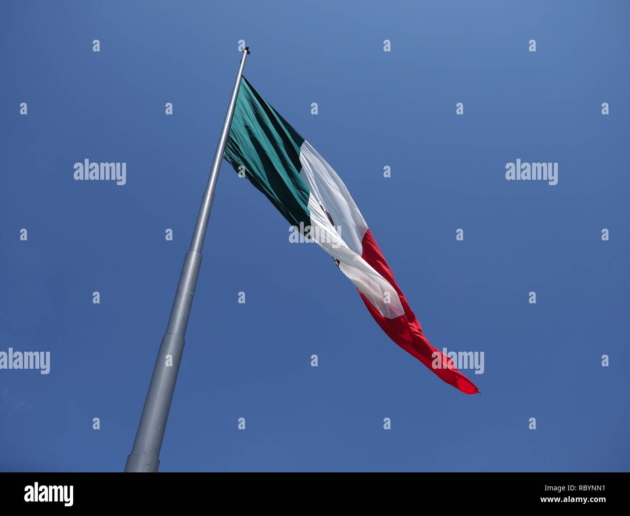 Famous national maxican flag on beach at bay of Pacific Ocean in ...