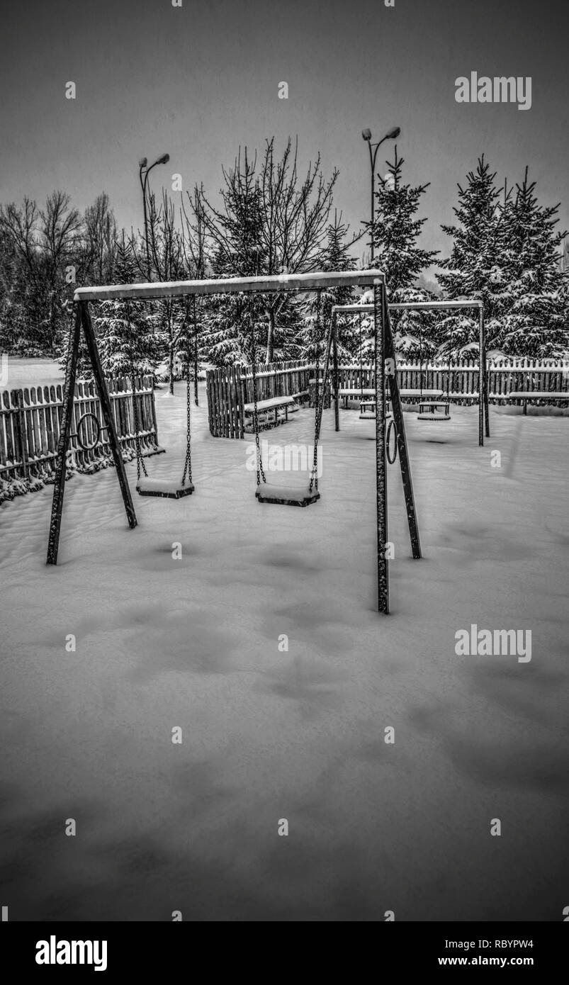 Children playing outside winter Black and White Stock Photos & Images ...