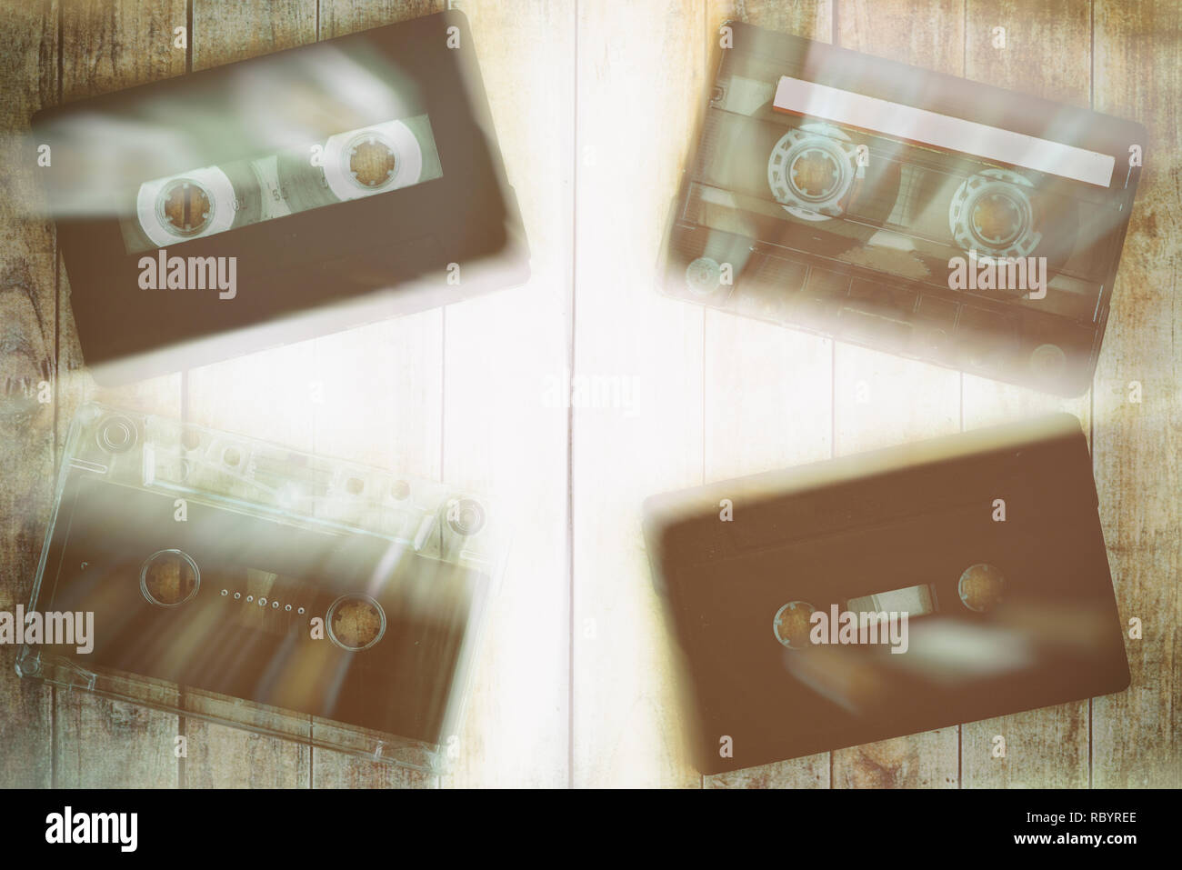 Old cassette tapes with a wooden background Stock Photo - Alamy