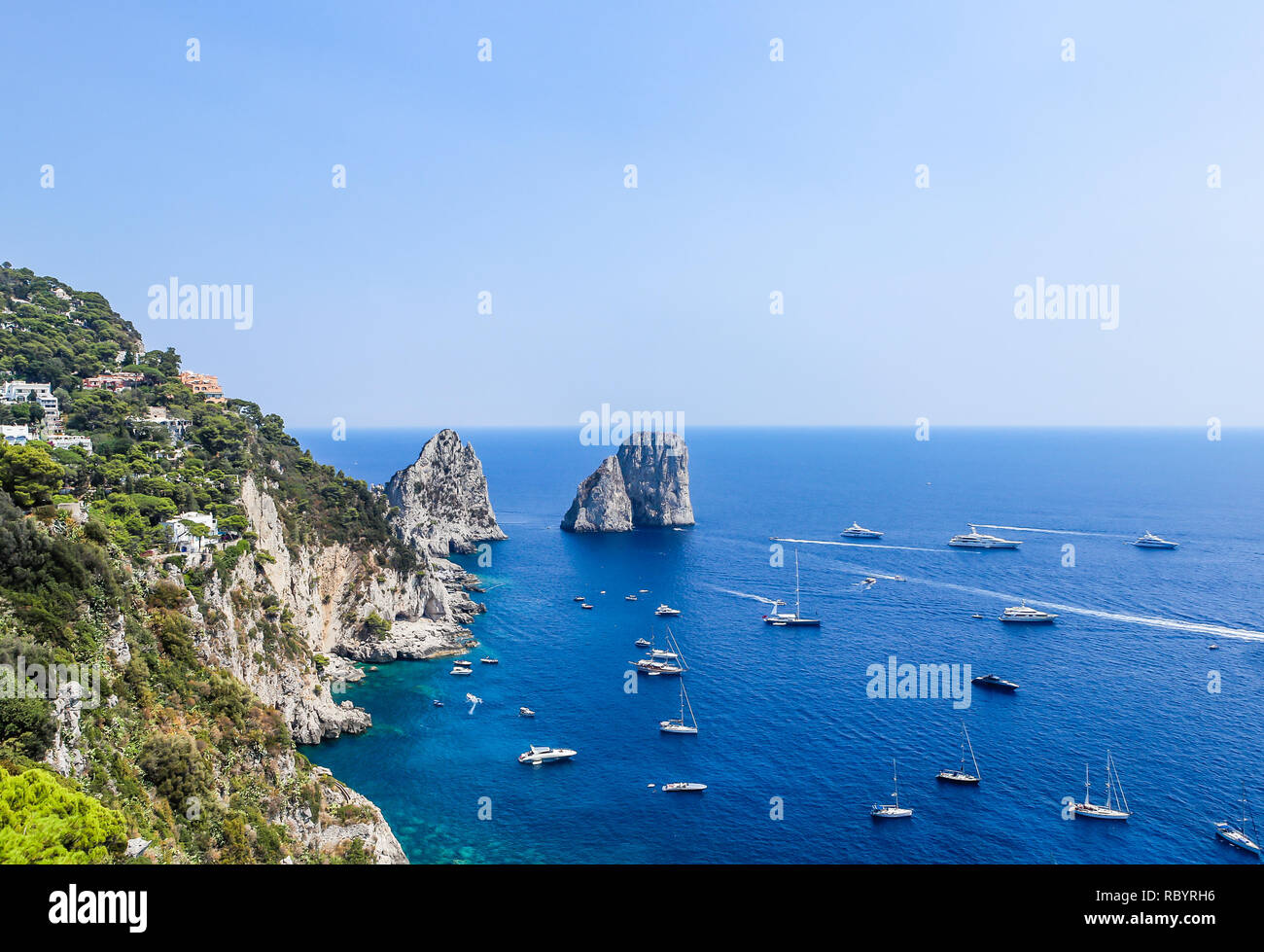 Italy. Capri Island. Faraglioni rock formation seen from Gardens of ...