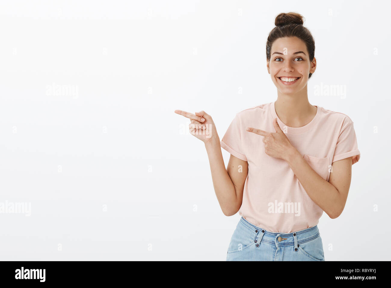 Woman looking up left smile hi-res stock photography and images - Alamy