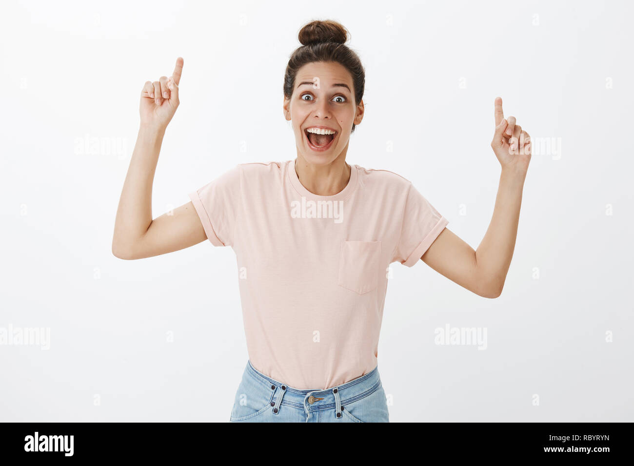 Impressed speechless and excited young happy female coworker ...