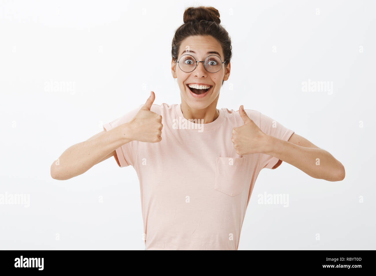 Excited supportive and happy charismatic female friend cheering mates ...