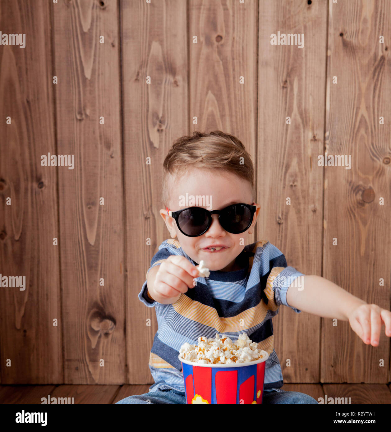 Little cute kid baby boy 2-3 years old , 3d imax cinema glasses holding ...
