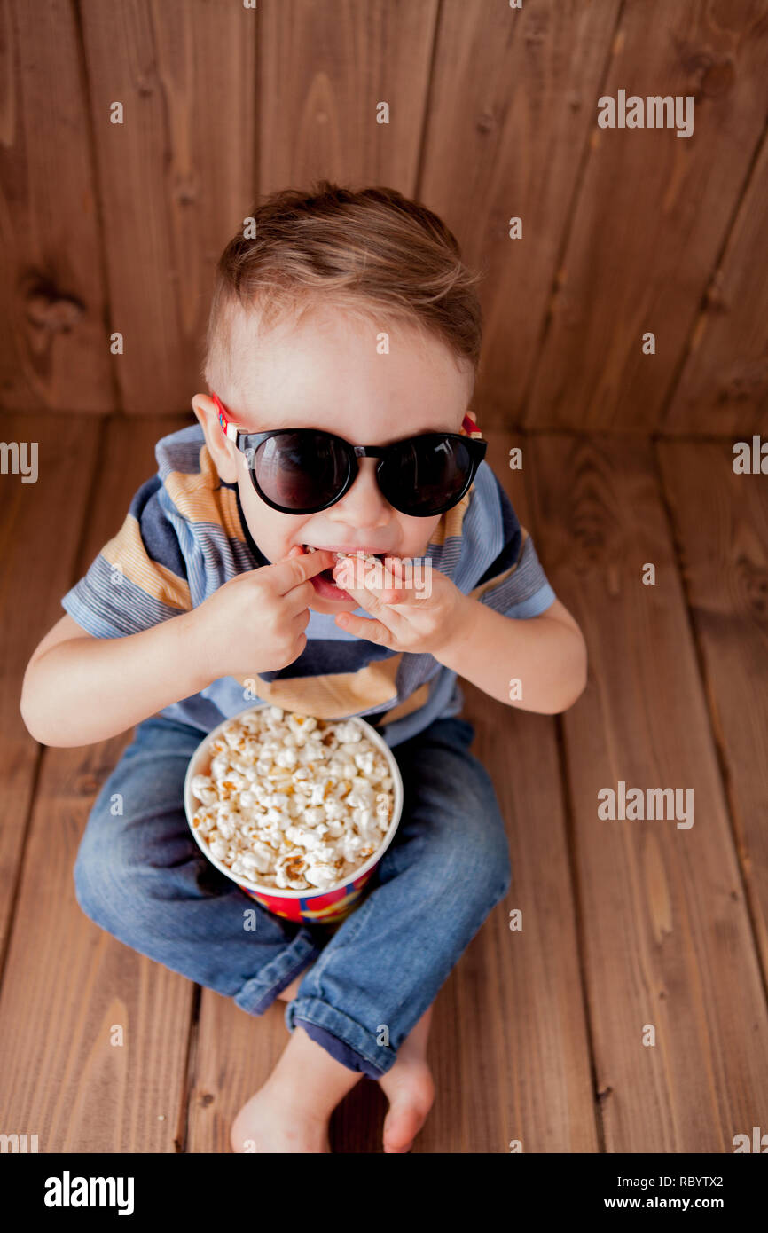 Little cute kid baby boy 2-3 years old , 3d imax cinema glasses holding ...