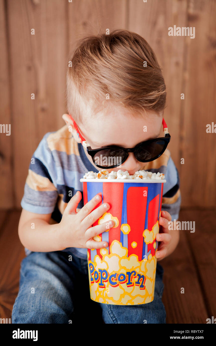 Little cute kid baby boy 2-3 years old , 3d imax cinema glasses holding ...