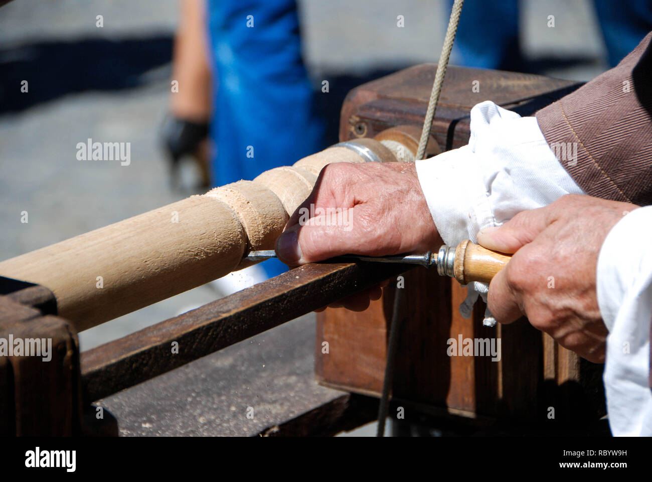 Turner works at one leg of a table Stock Photo - Alamy