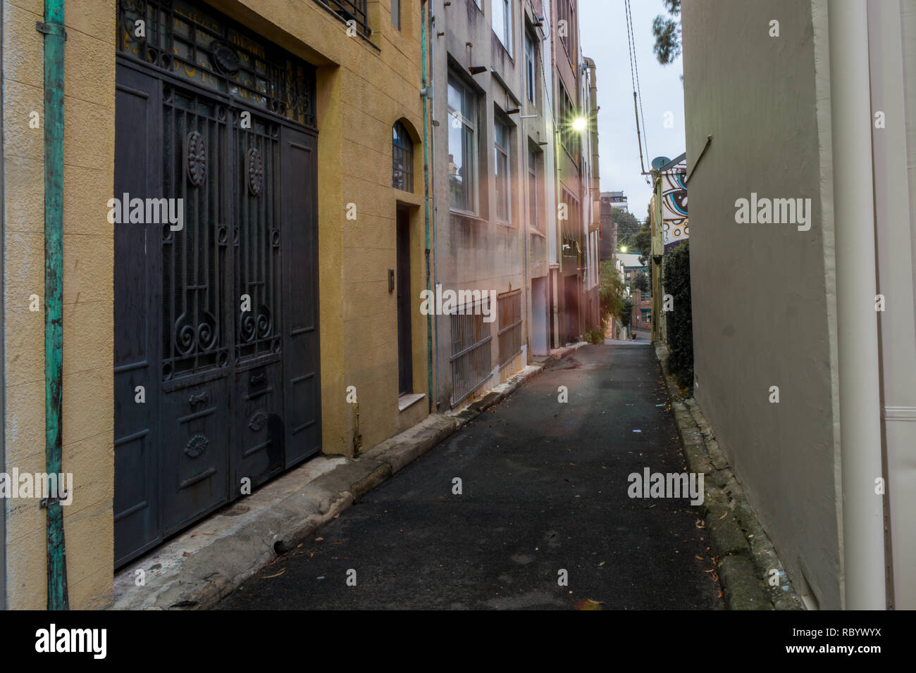 city alley in the early morning Stock Photo - Alamy