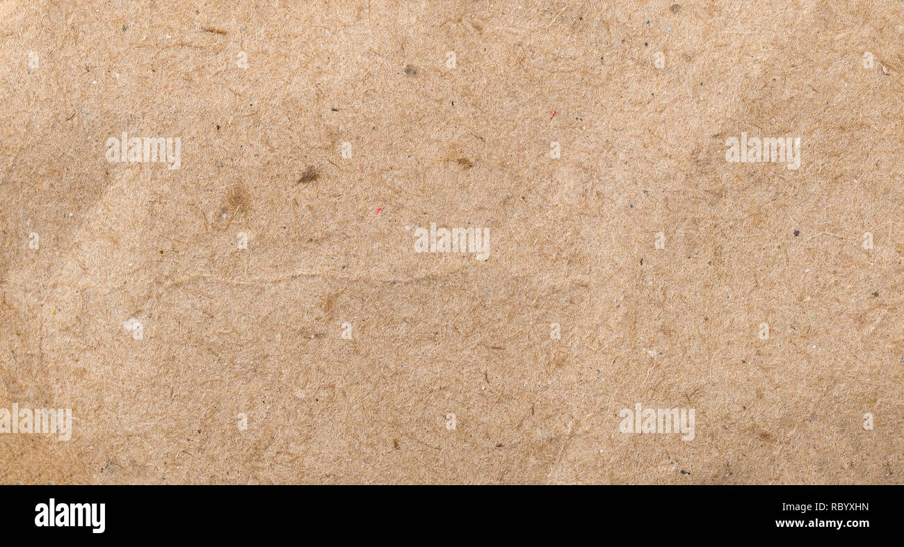 detail paper structure. light ocre paper background Stock Photo - Alamy