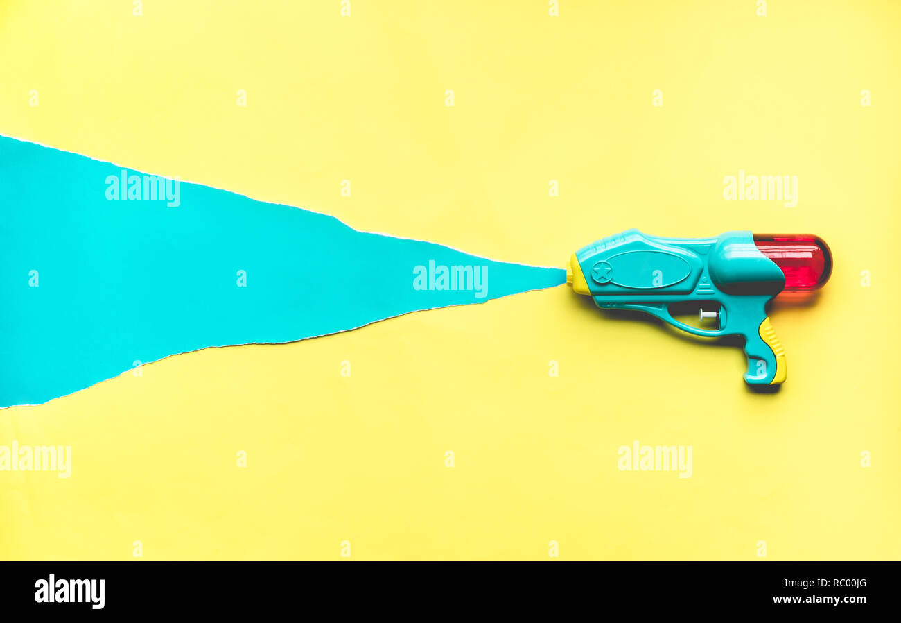 Colorful of water gun on color paper background.Refreshing and holiday ...