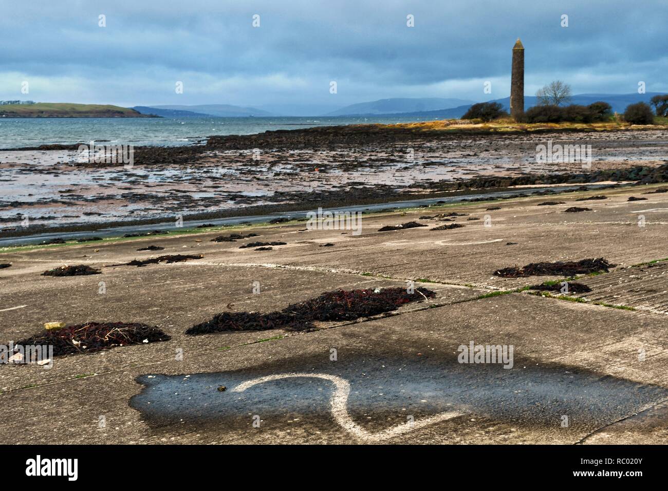Pencil Monument in Largs surrounded by tidal landscape Stock Photo - Alamy
