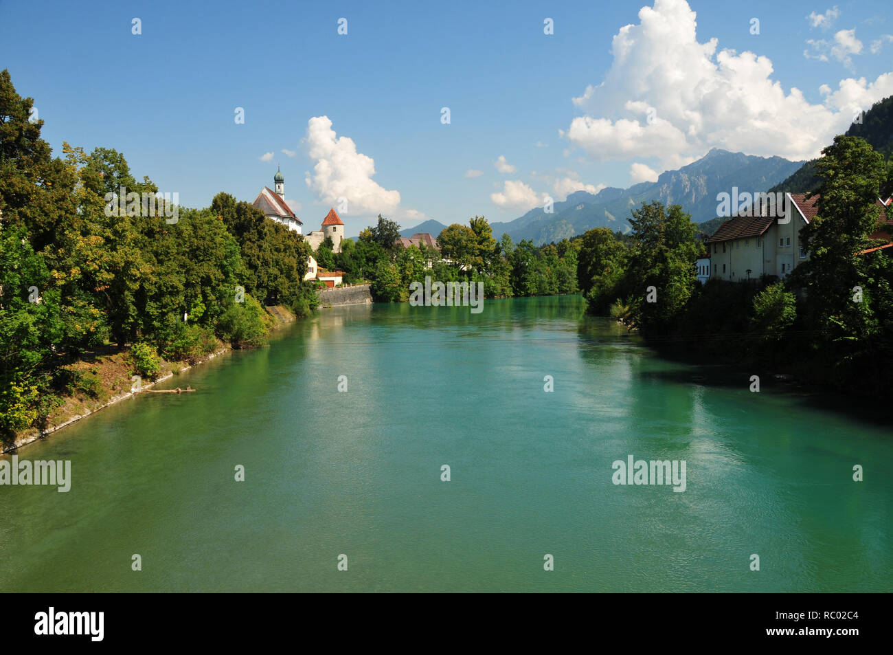 a view over Lake Forggen with blue sky clouds and a church Stock Photo ...