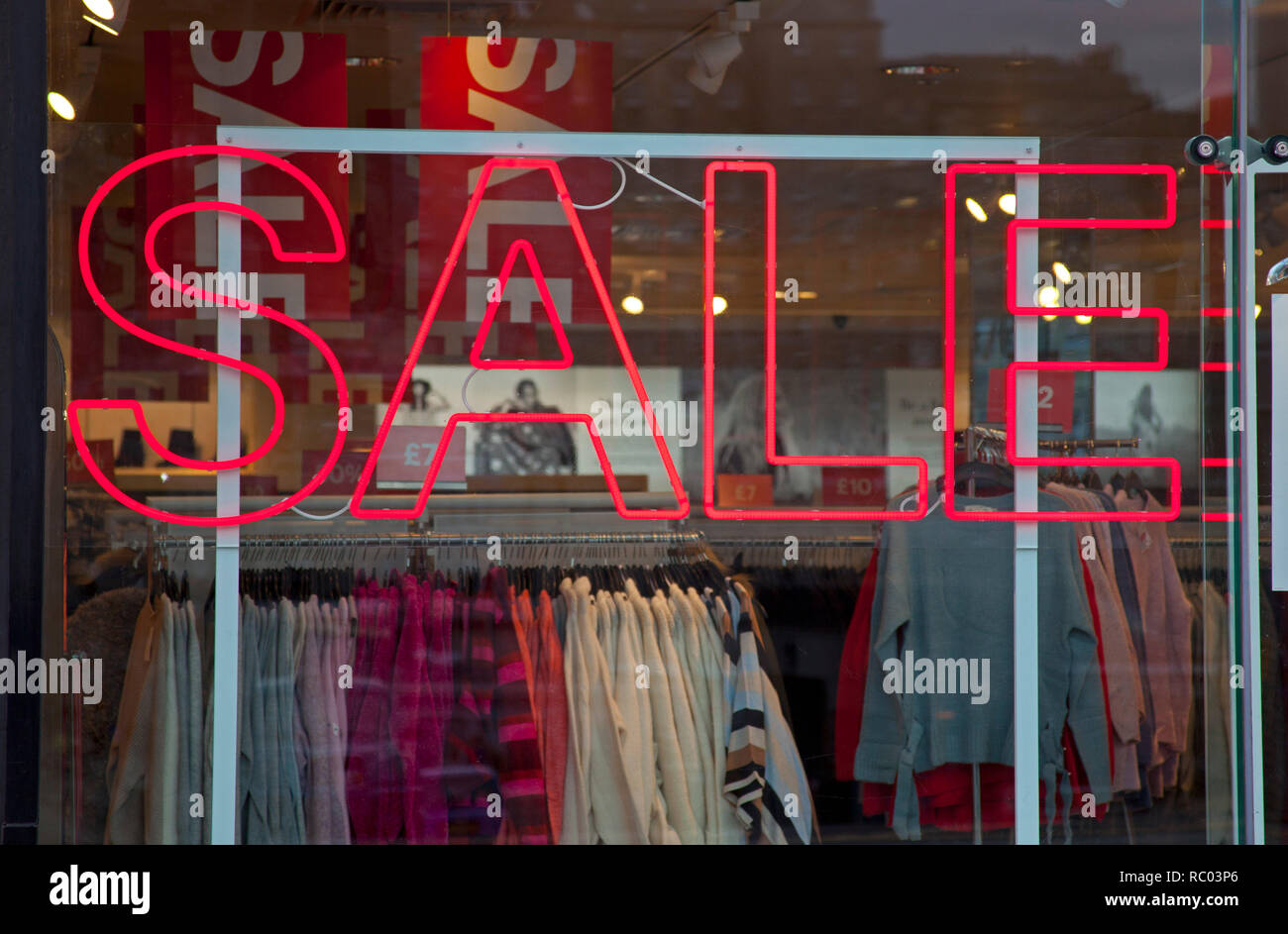 Sale sign in retail store window, Edinburgh, Scotland, UK Stock Photo ...