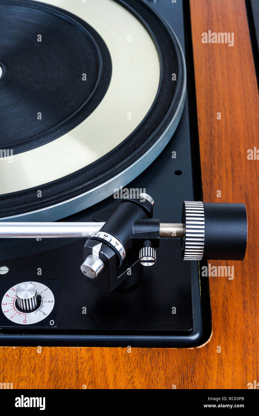 Side view of vintage turntable vinyl record player isolated on white ...