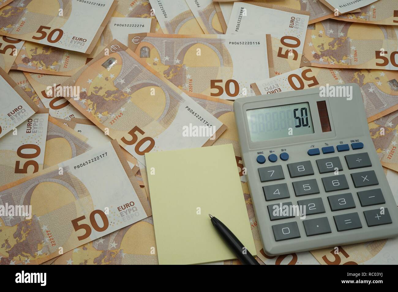 Calculating your money Stock Photo - Alamy