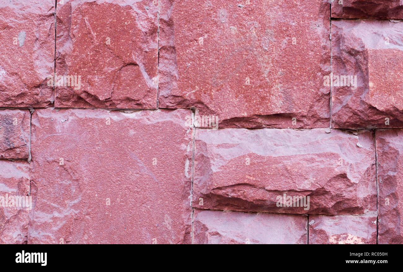 modern red stone tiled wall background. texture, geological Stock Photo ...